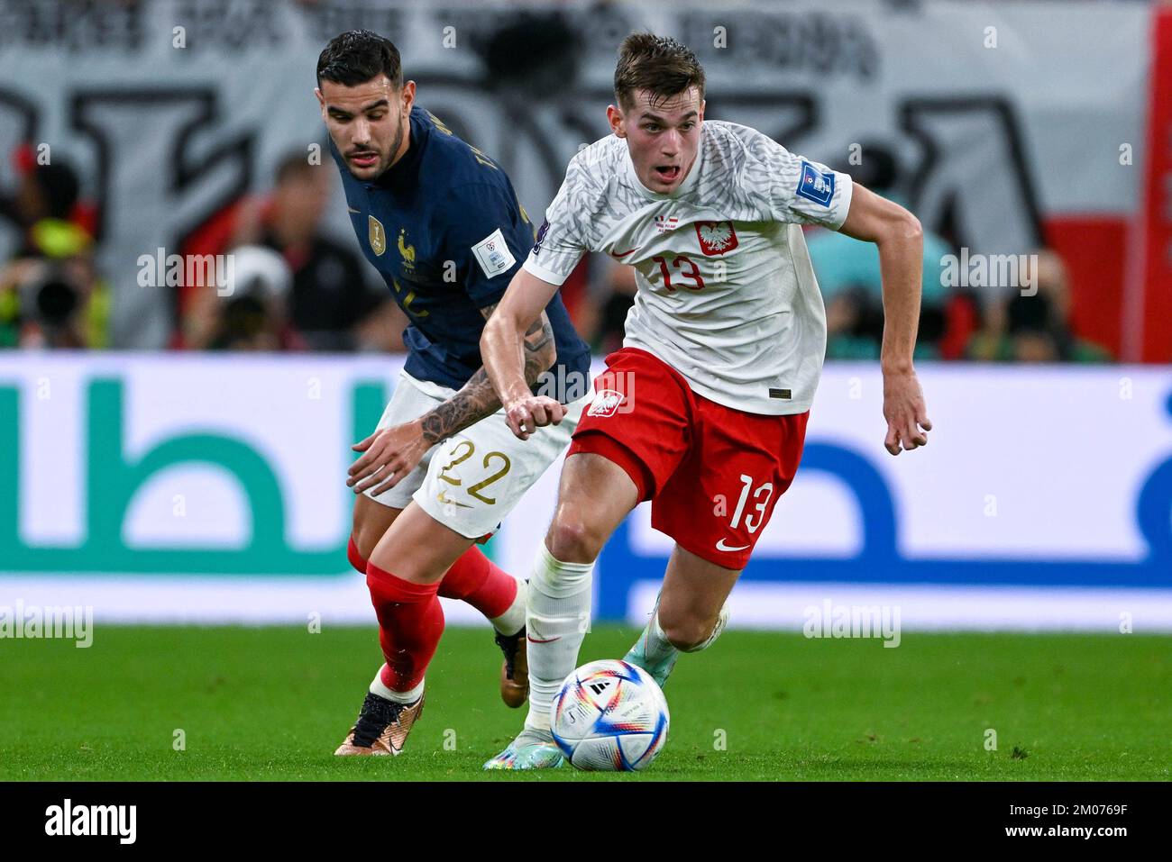 Jakub Kaminski of Poland and Theo HERNANDEZ of France during the FIFA ...