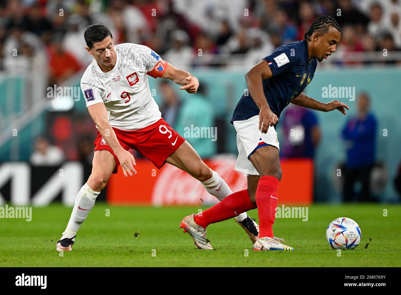 Robert Lewandowski of Poland and Jules KOUNDE of France during the FIFA ...