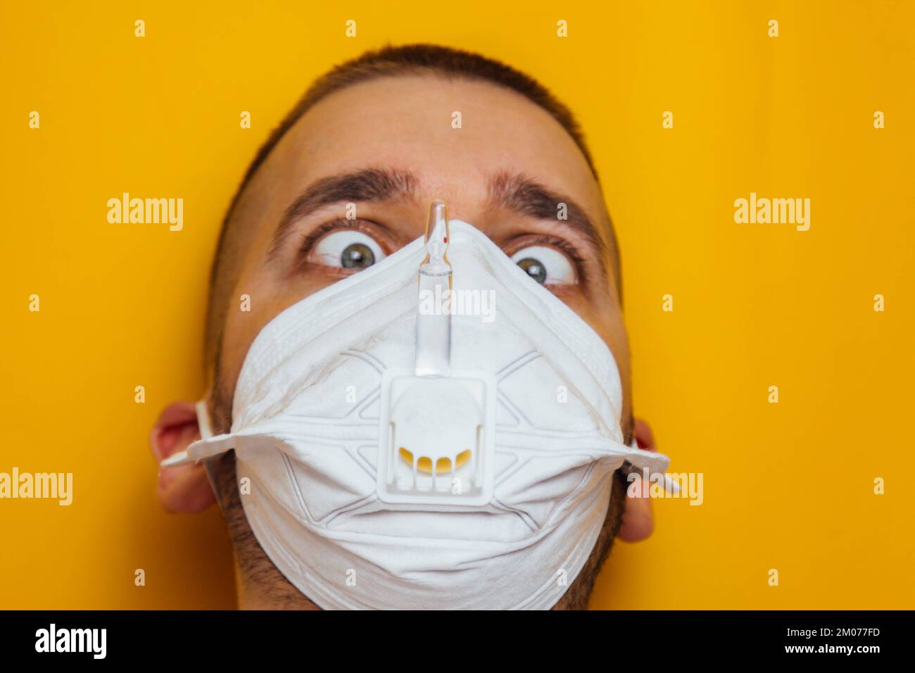 Scared man wearing protective hi-res stock photography and images - Alamy