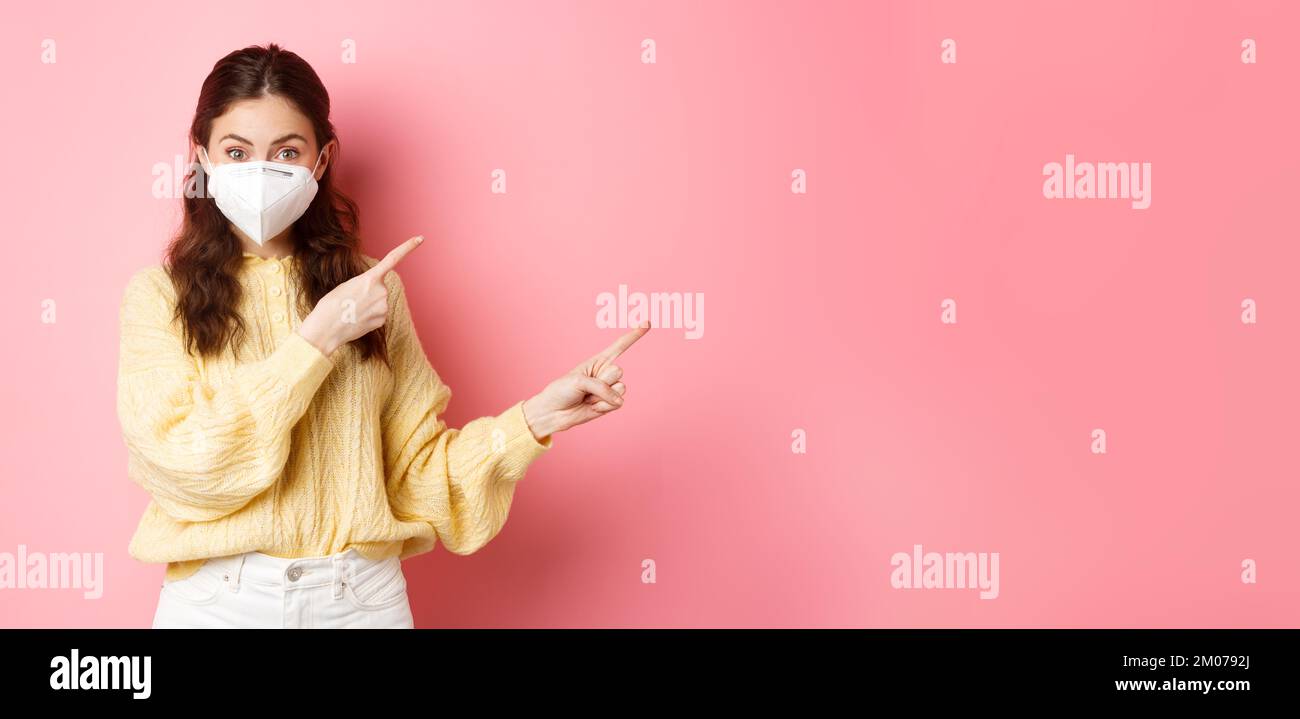 Covid, corona and social distancing concept. Excited female model in ...