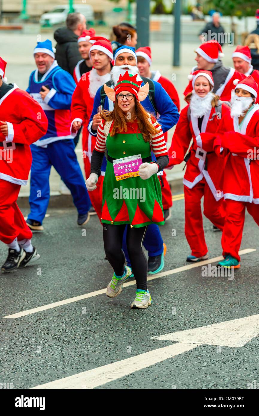 Liverpool, UK. 04th Dec, 2022. A woman in an elf costume takes part ...