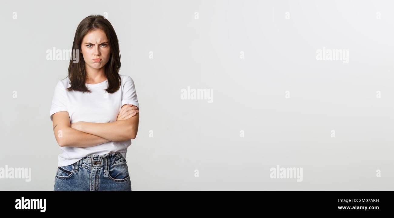 Angry sulking girl cross arms and frowning, feeling offended Stock ...