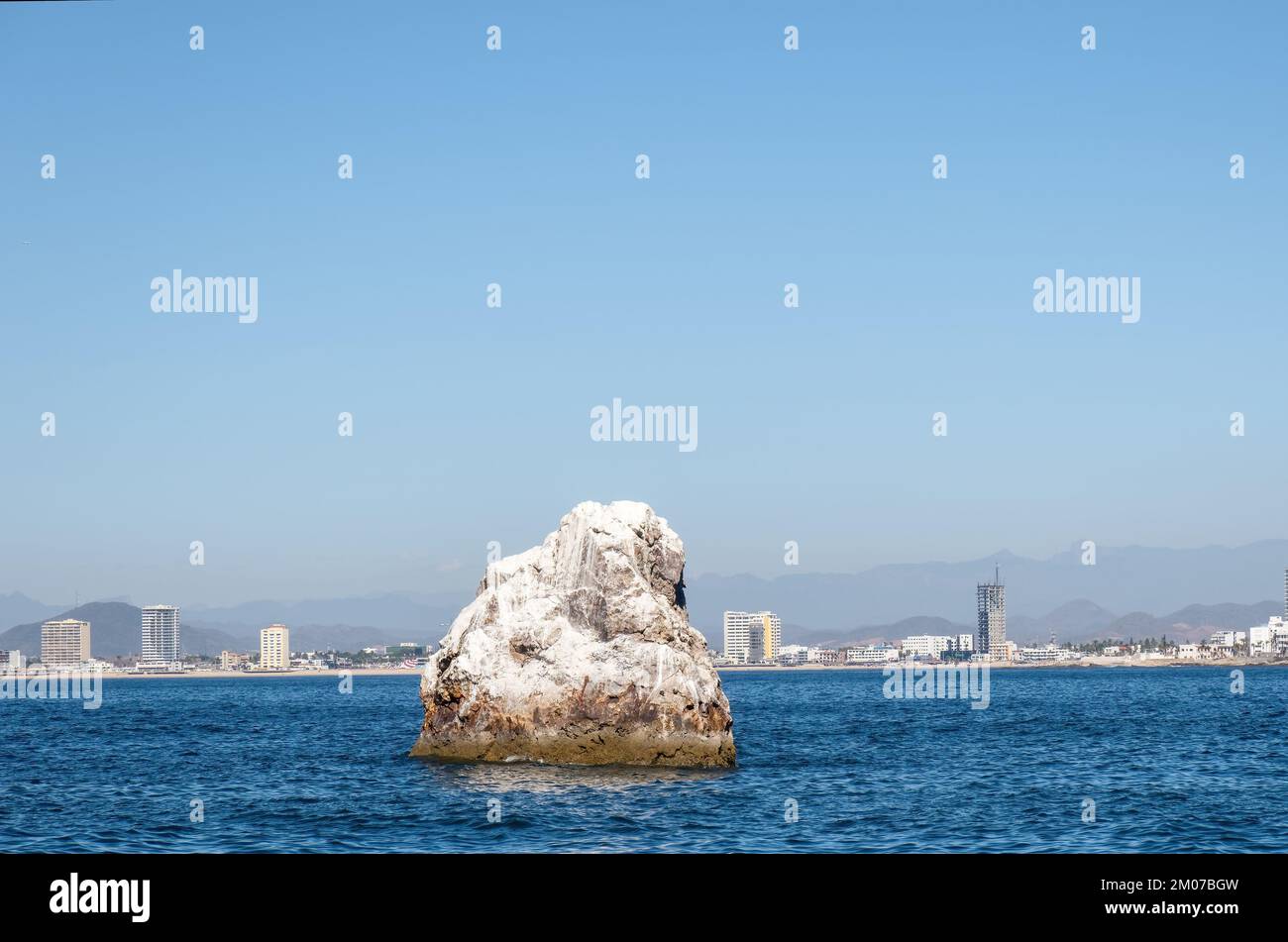 Marine cave in the port of Mazatlan, Sinaloa, Mexico, worn by bird ...