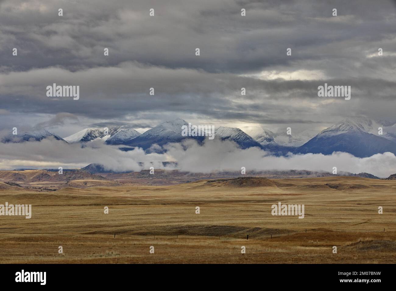 Beautiful scenery of distant mountains and wide prairie abound on Rt ...