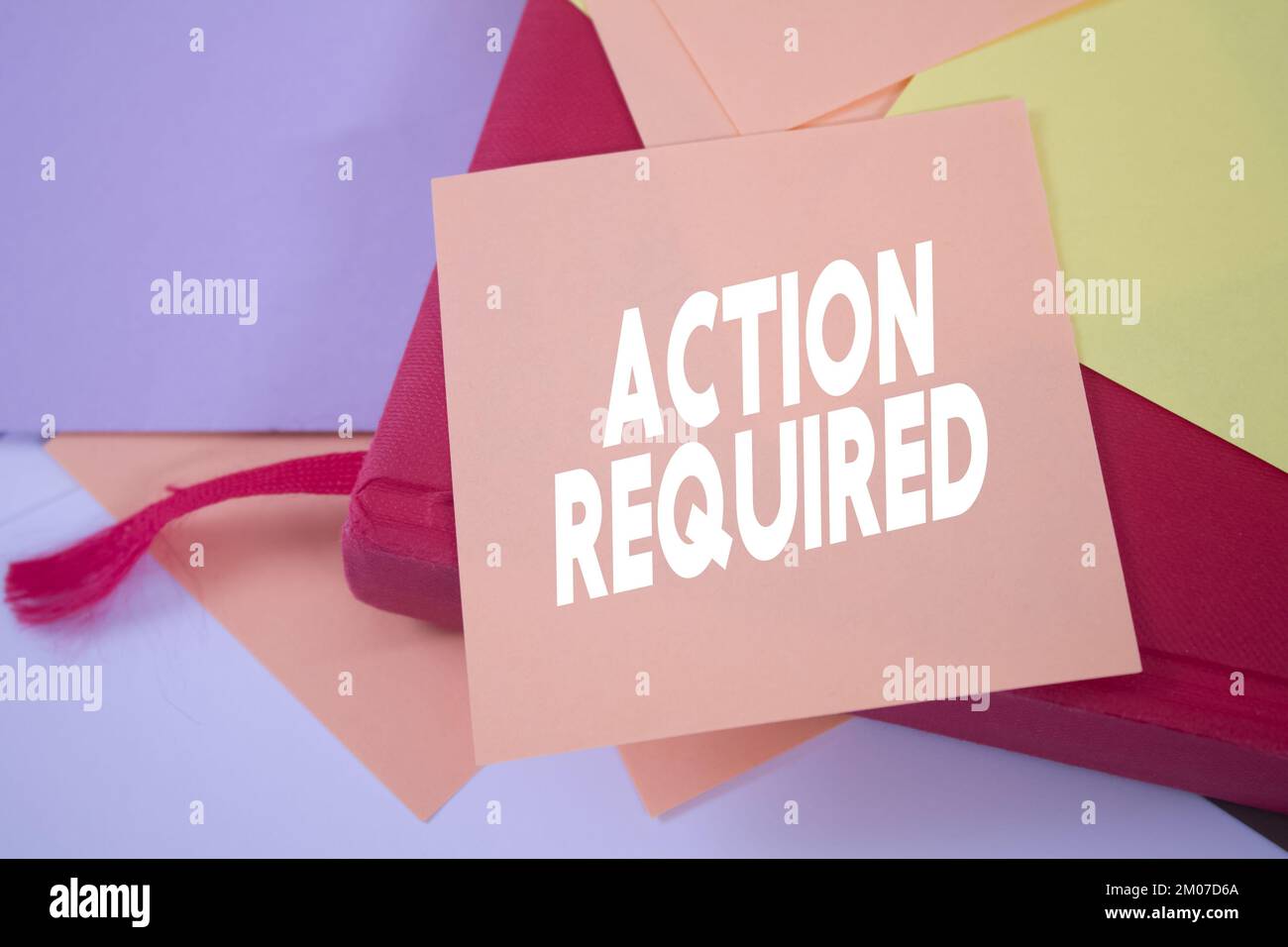 Action Required. Text on adhesive note paper. Event, celebration ...