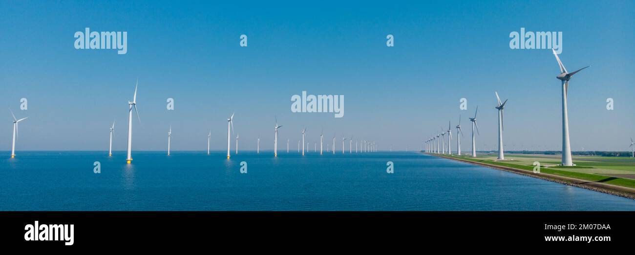 Windmill turbines at sea , drone view at windmill turbines in the ocean ...