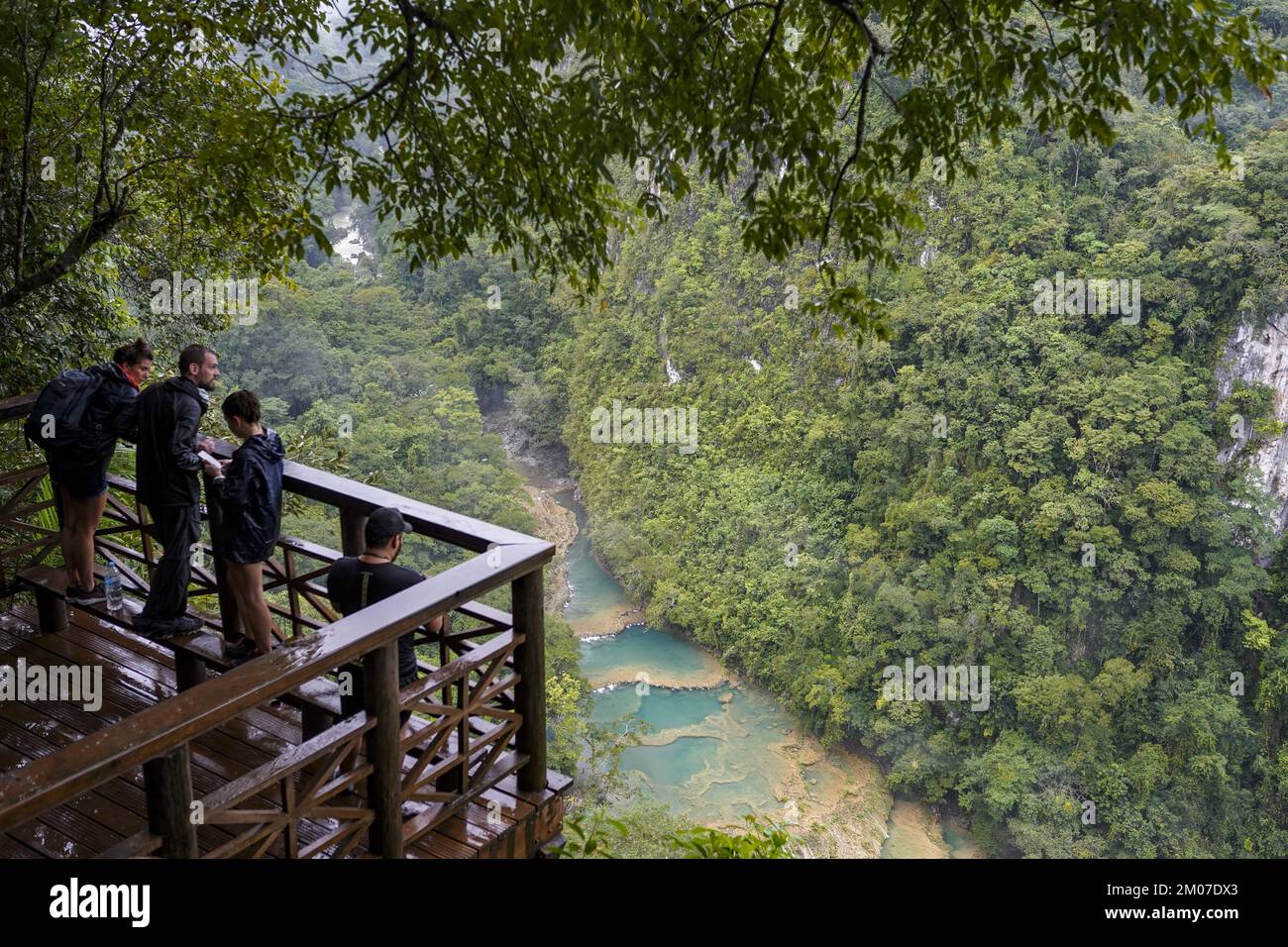 Tourists enjoy Semuc Champey. Semuc Champey is a natural monument with ...