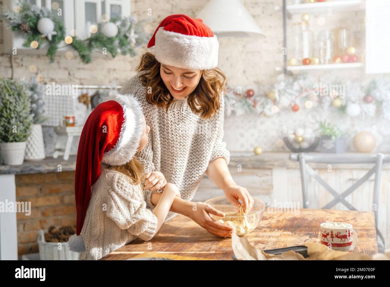 Merry Christmas and Happy Holidays. Family preparation holiday food ...