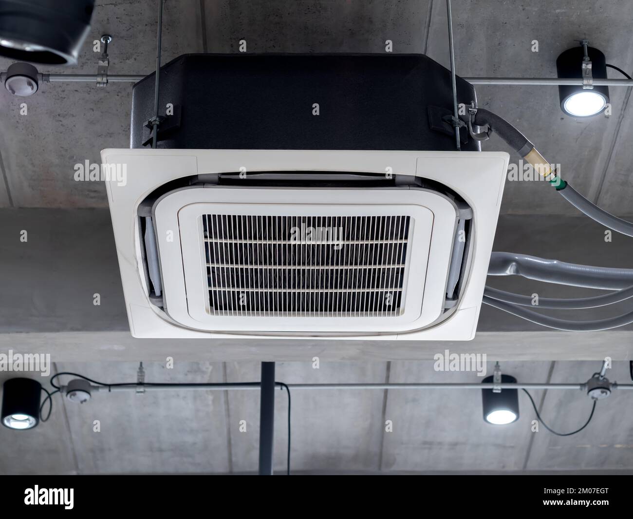 Ceiling mounted cassette type air conditioner decoration near the spot ...