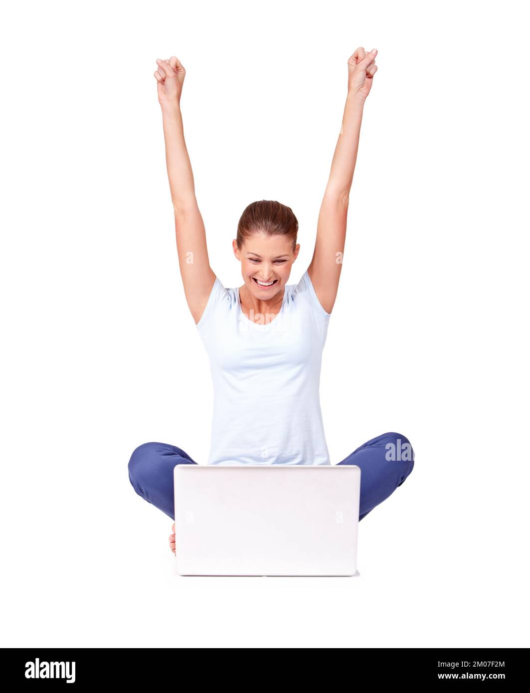 Finally finished it. A young woman looking at her laptop screen and ...