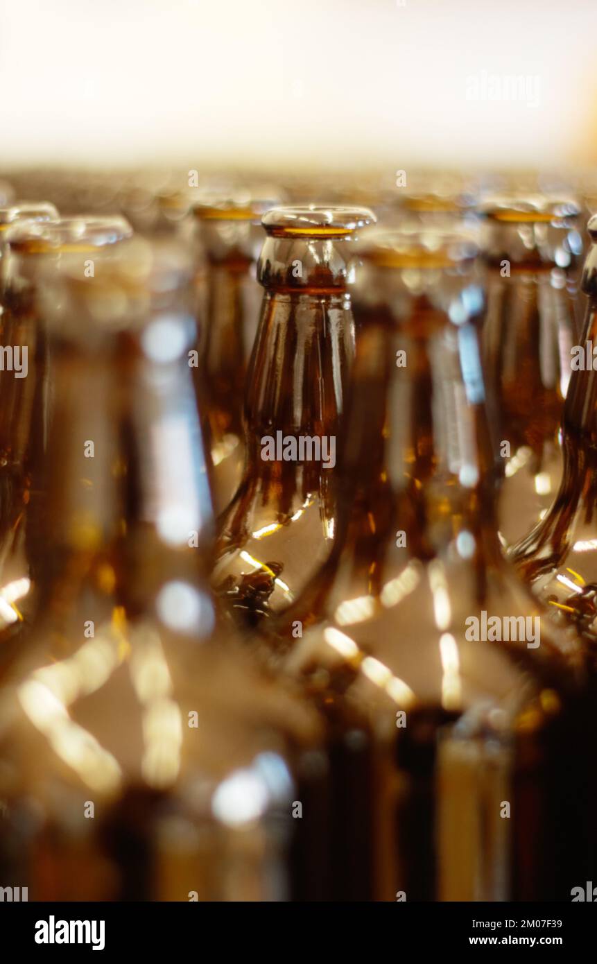 Ready to be re-filled. Closeup shot of a collection of empty glass ...