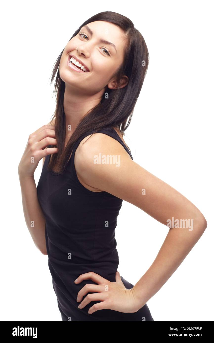 Her beauty is undeniable. A cute young girl posing on a white ...