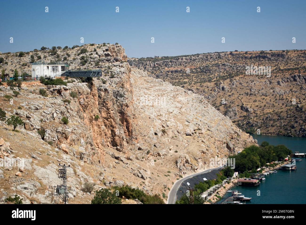A glass watching terrace above river and over rock formation for ...
