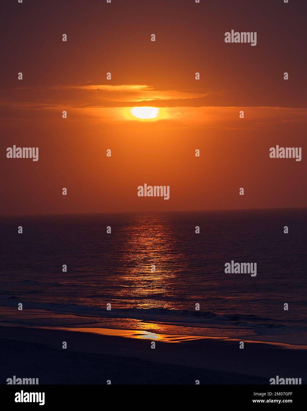 Beautiful Golden Sunset Over a Beach With Sun Shining on Water Stock ...