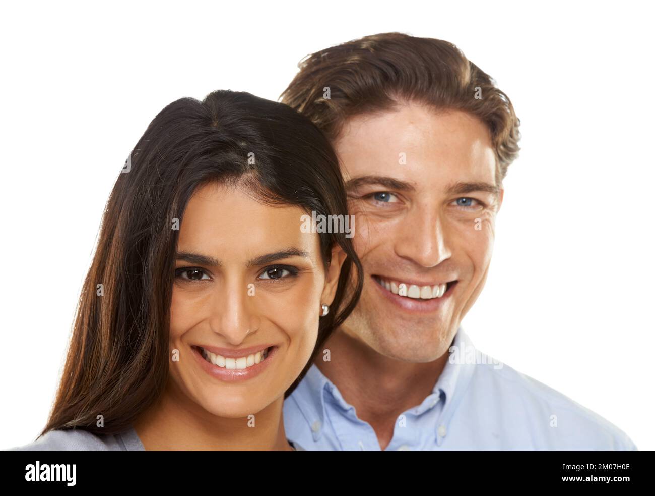 Partners in life. Head and shoulders portrait of a happy young couple ...