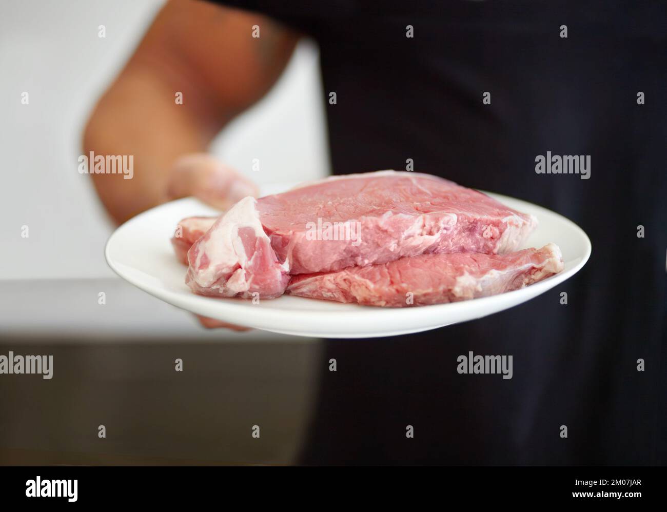 Ensuring his diet contains enough protein. Cropped image of a muscular ...