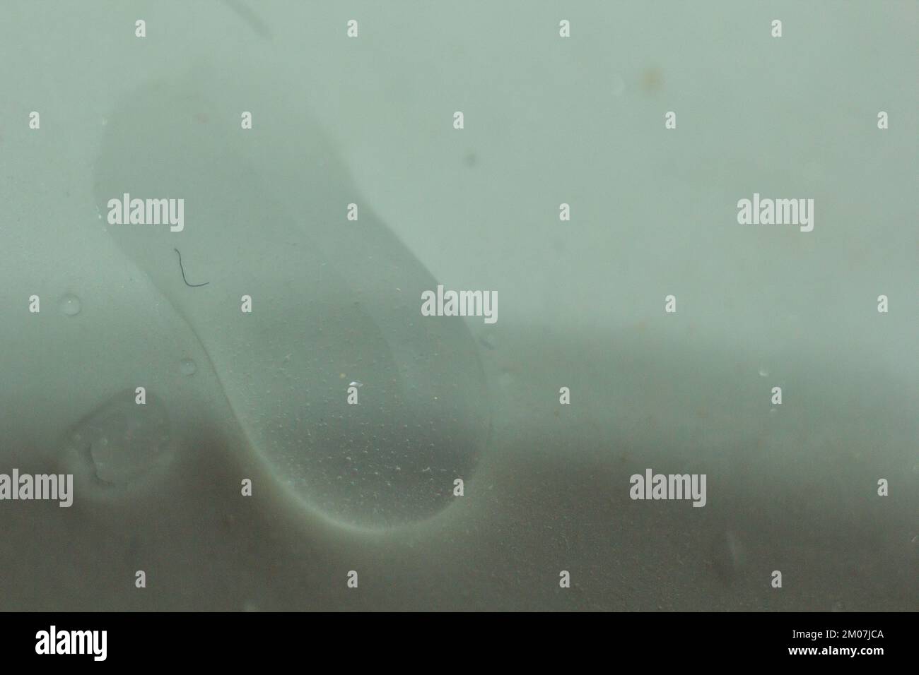 Close up water drops on grey tone background. Abstract white gray wet ...