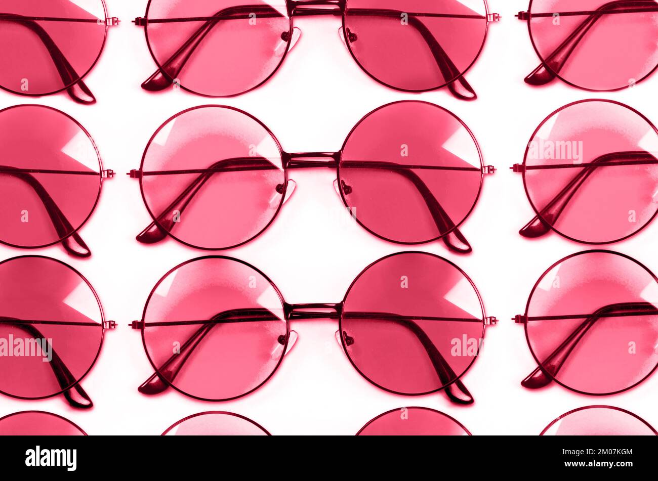 Color of year 2023.Viva magenta. Pink style glasses isolated on white ...