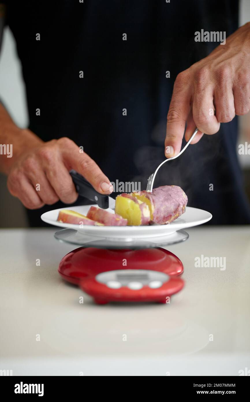 Healthy no matter which way you slice it. Cropped image of a man ...