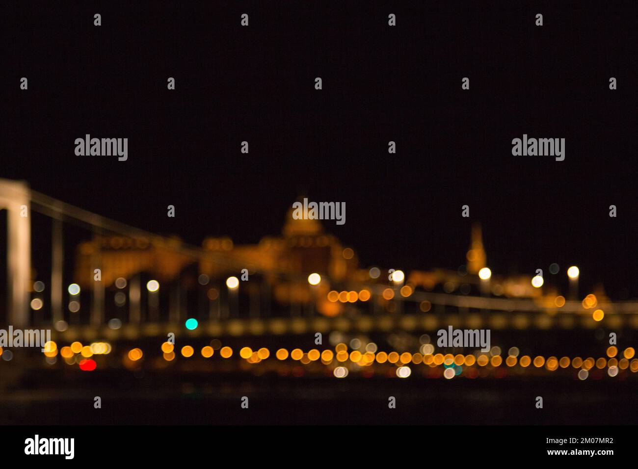 blurry lights of a big city at night. Background for travel photos ...