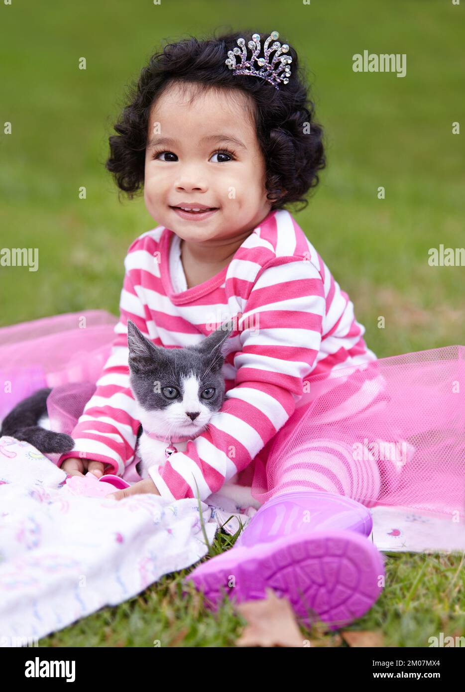 My wittle fuwwy fwend. Cute little girl sitting on a blanket outside ...