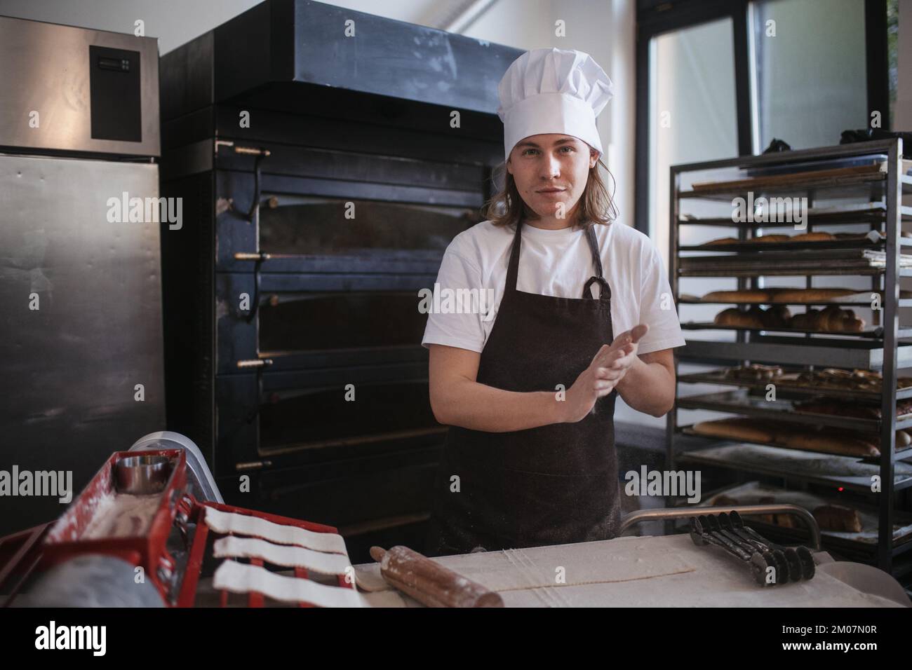 Male baker preparing dough in hi-res stock photography and images - Alamy