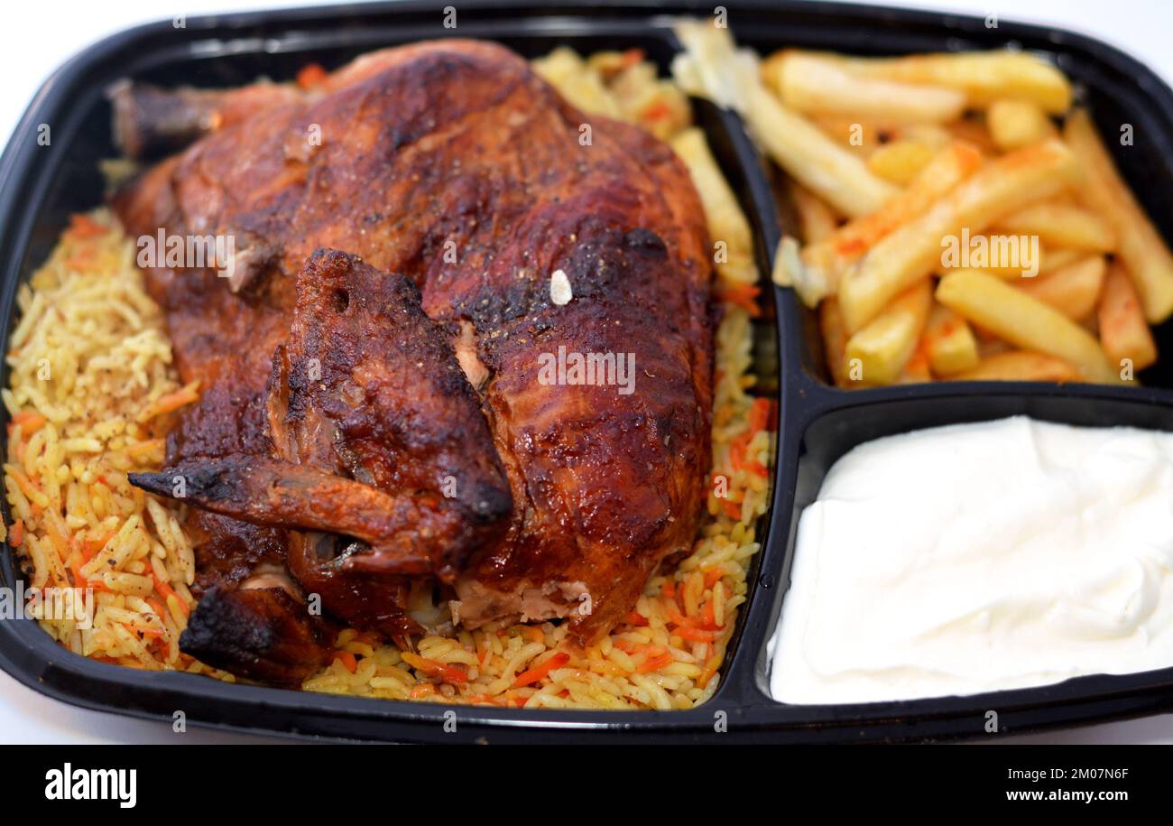 Arabic Syrian cuisine of machine grilled barbecued chicken with ...