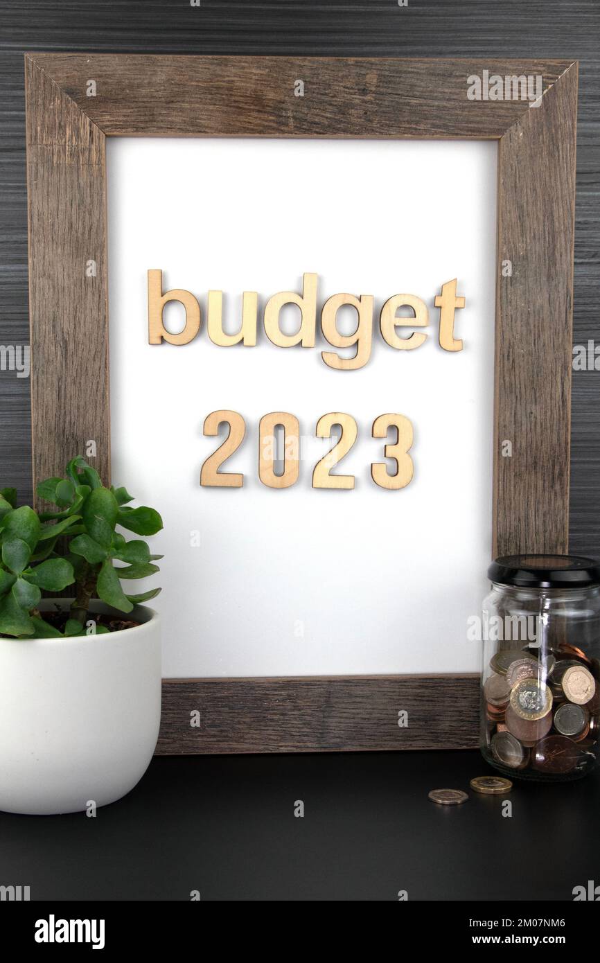 Rustic sign with words Budget 2023 Stock Photo - Alamy