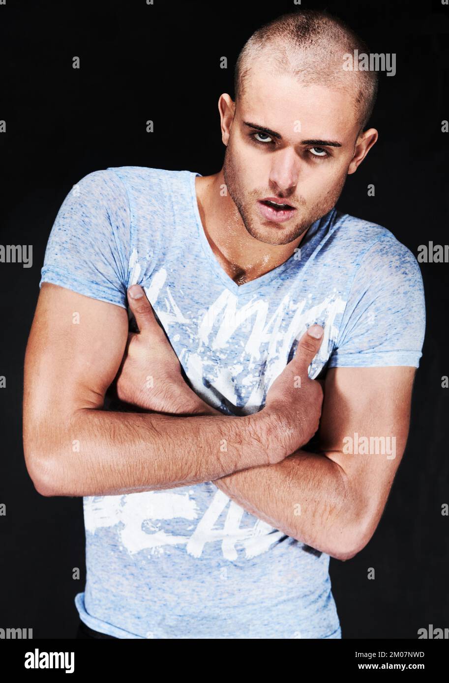 Hes unimpressed by you. A disturbed looking young man standing with his ...