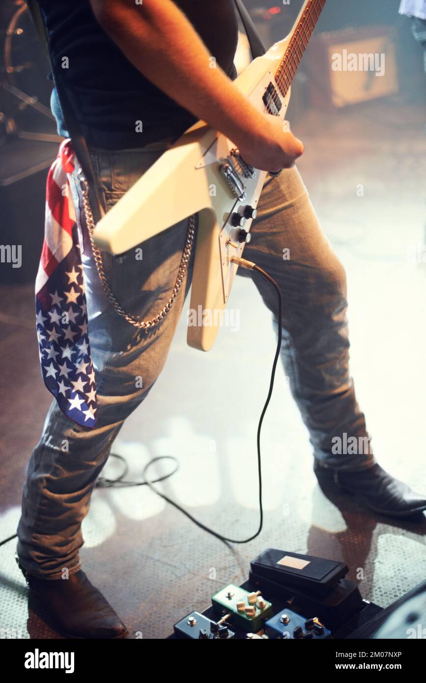 Musician, legs and guitar for rock performance at music festival, dance ...