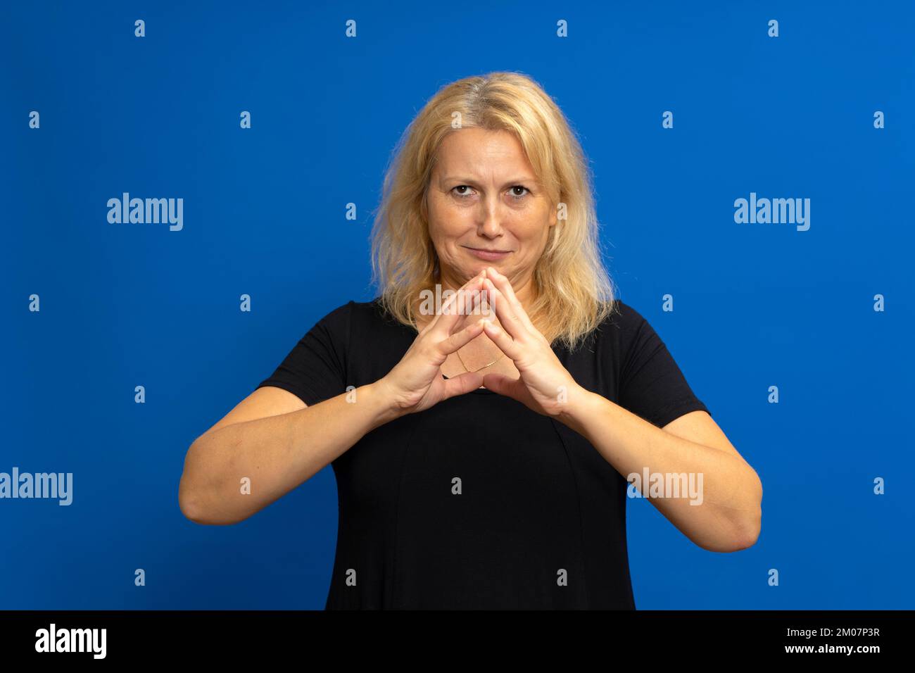 Female cunning smiling emotion hi-res stock photography and images - Alamy