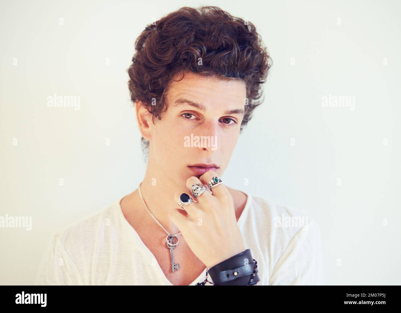 Cool and contemplative. Studio portrait of a handsome young man wearing ...