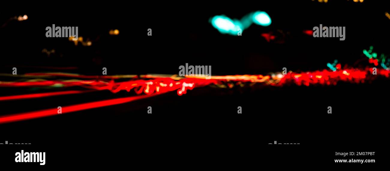 Lights of cars at night. Street line lights. Night highway city. Long ...