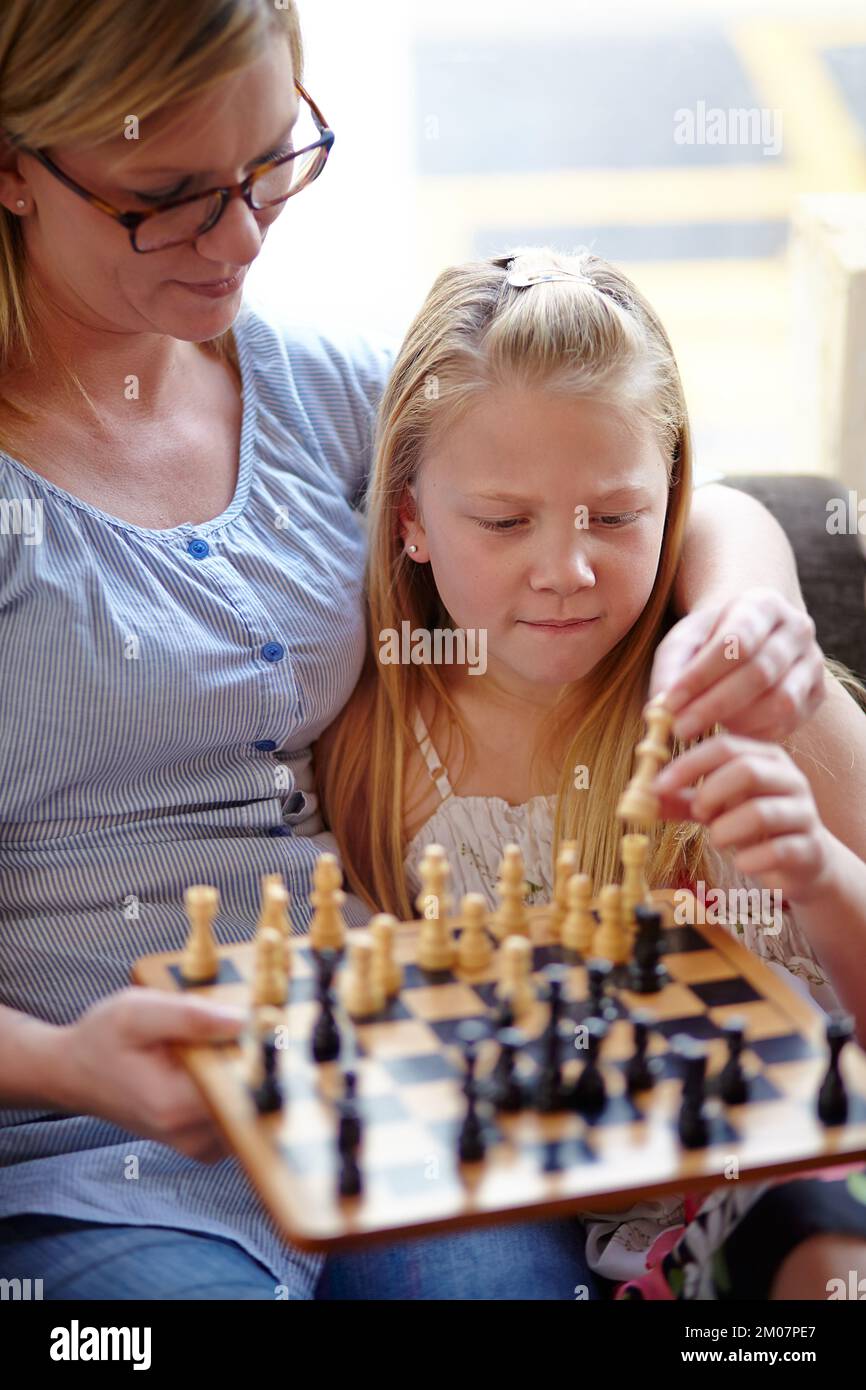 Portrait of a woman playing chess hi-res stock photography and images ...
