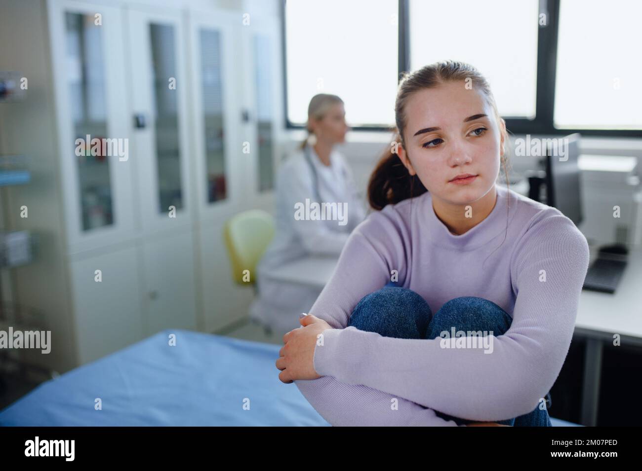 Depressed patient at doctor hi-res stock photography and images - Alamy