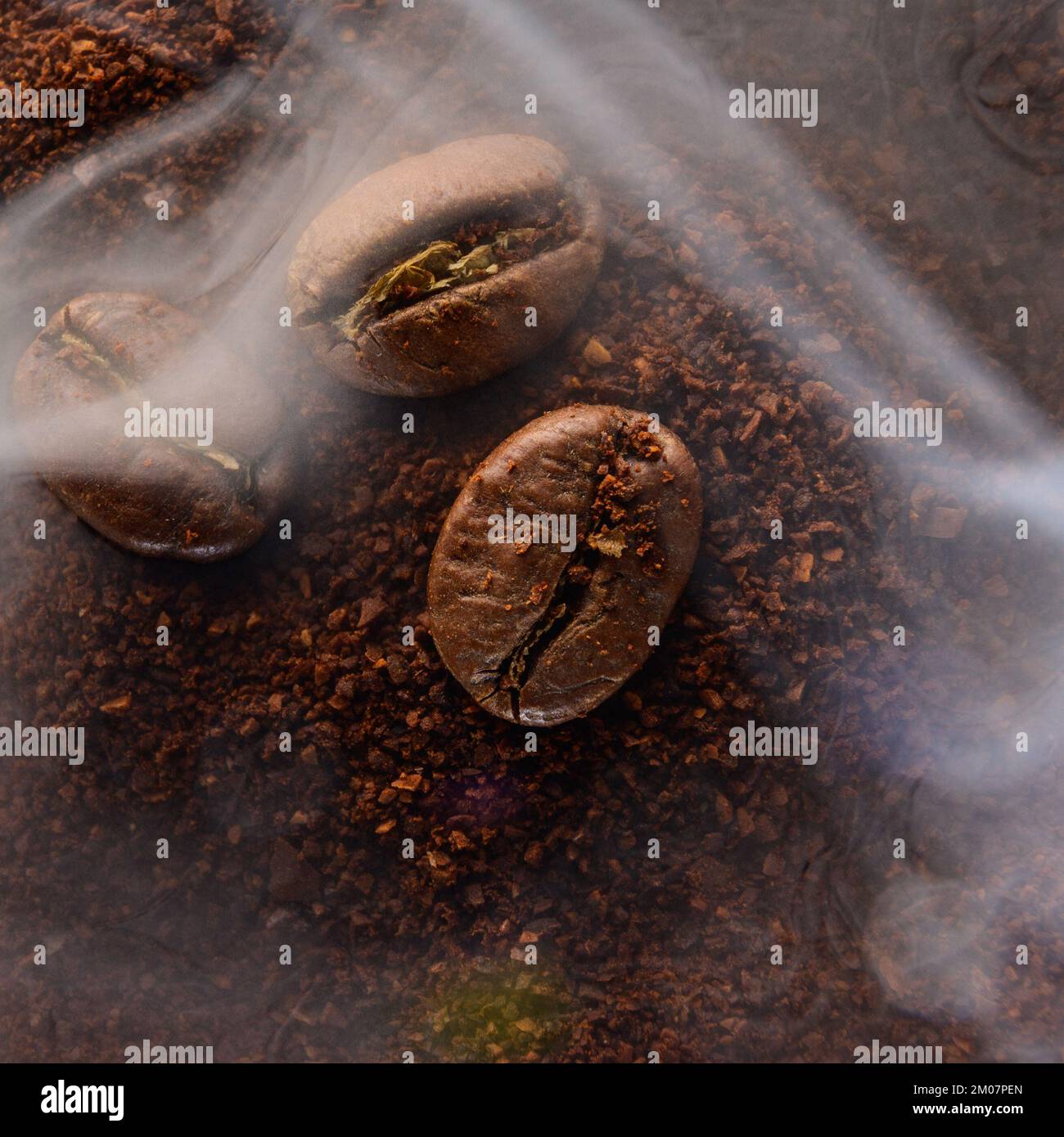 Ground coffee and coffee beans, lightly smoked coffee, coffee texture ...