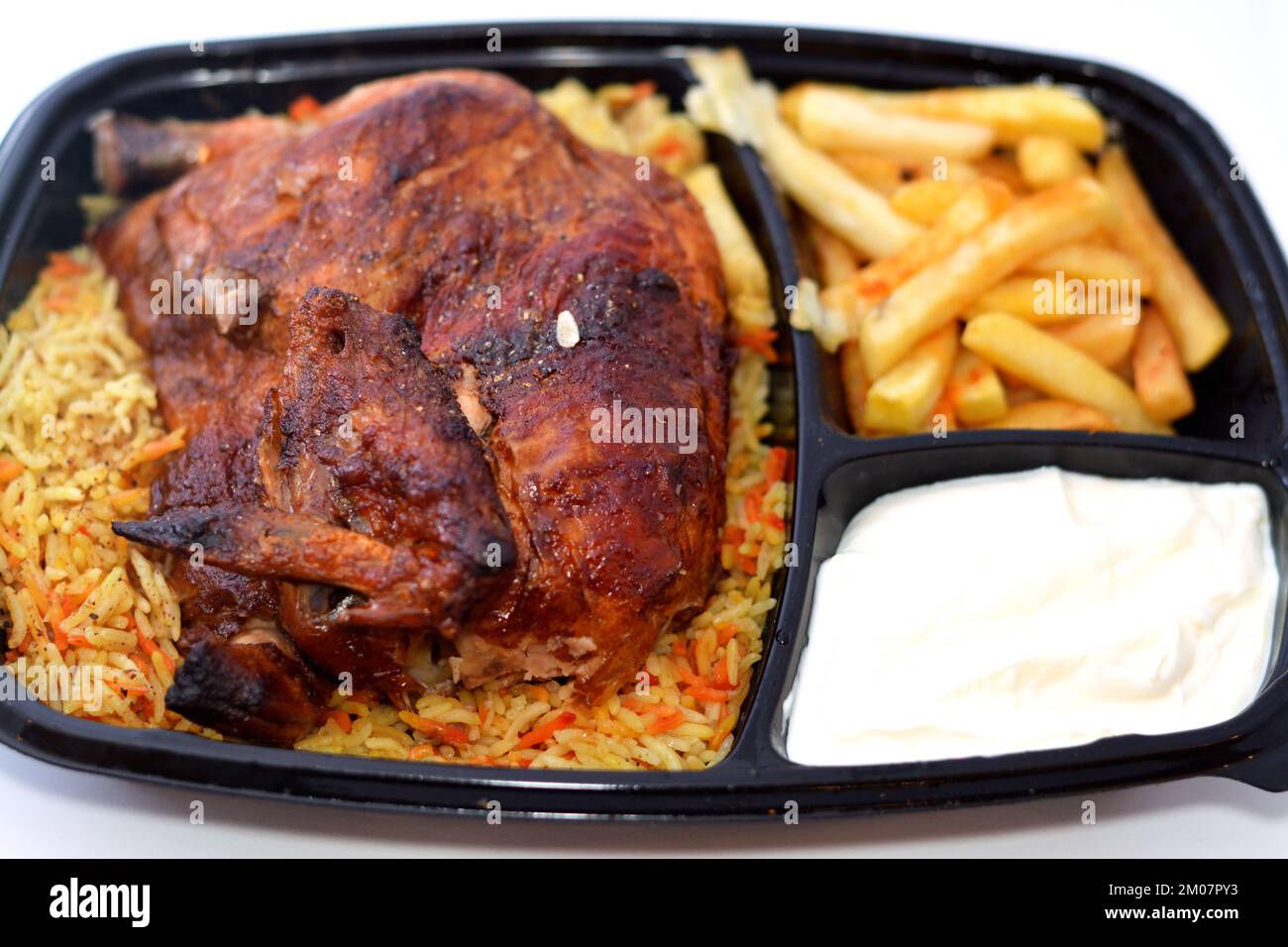 Arabic Syrian cuisine of machine grilled barbecued chicken with ...