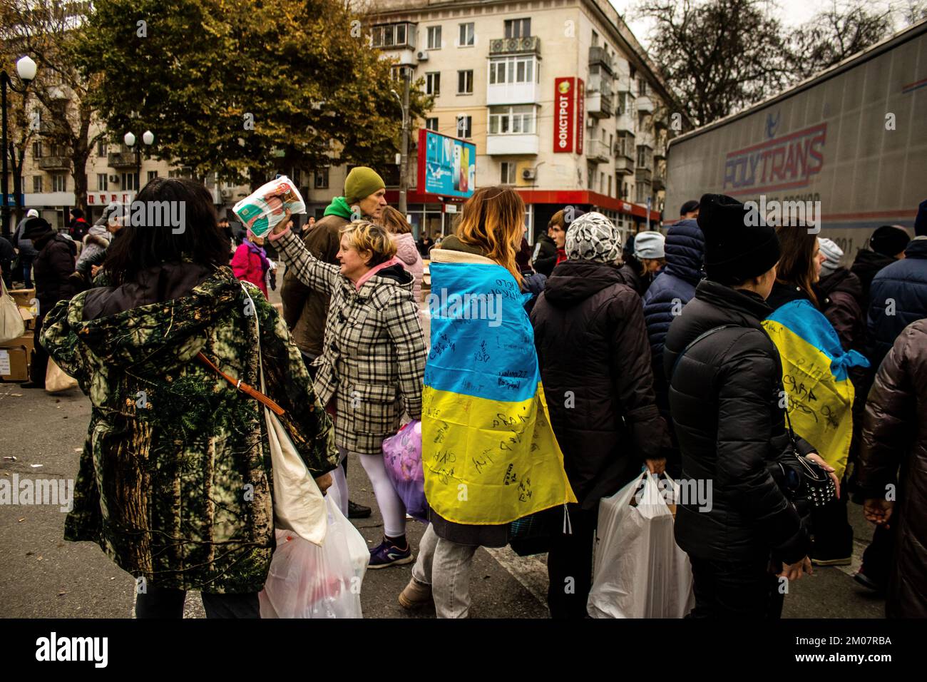 Citizens of Kherson receive humanitarian aid at Freedom Square in the ...