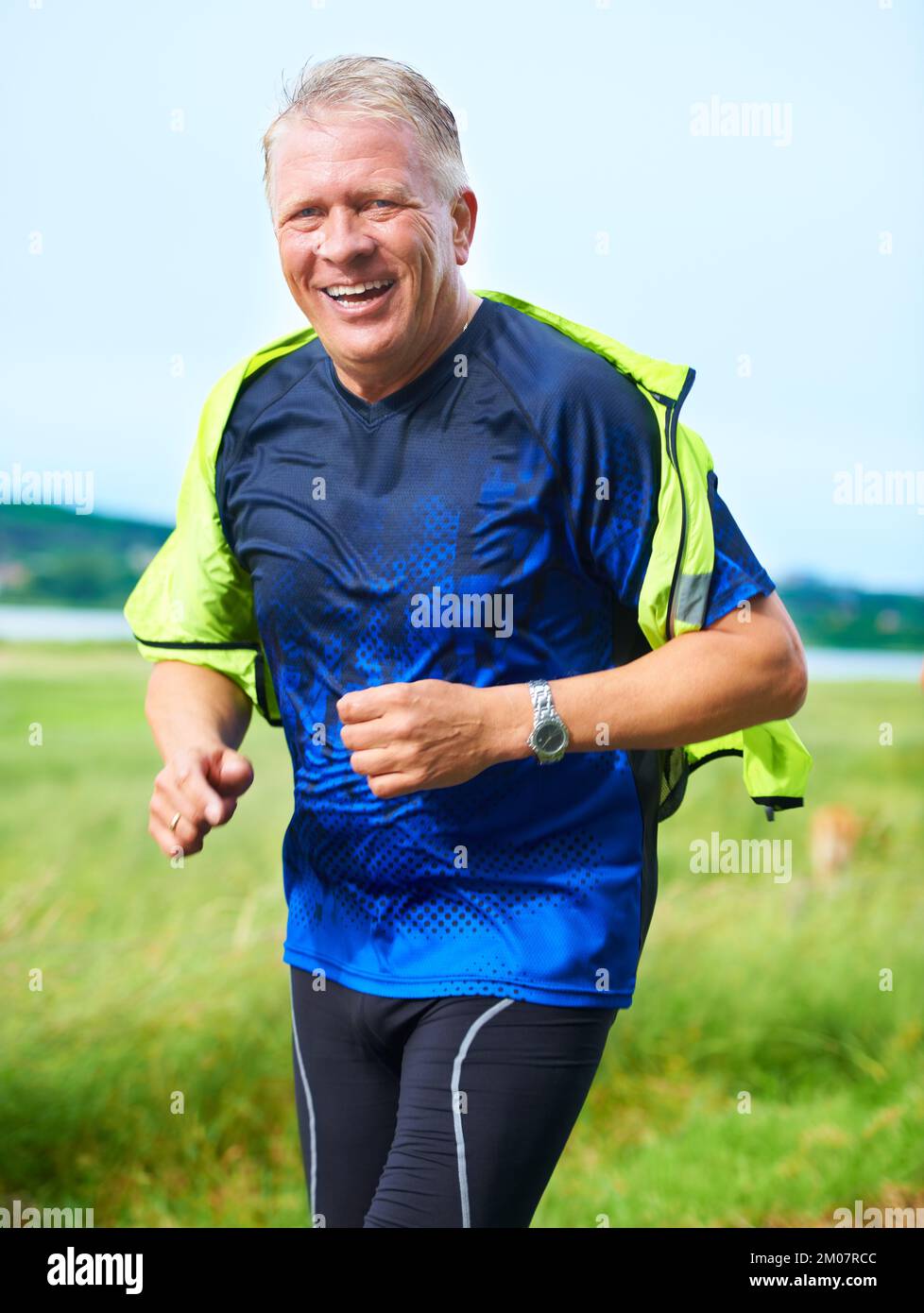 Us seniors need to keep in shape. Portrait of a senior man running ...