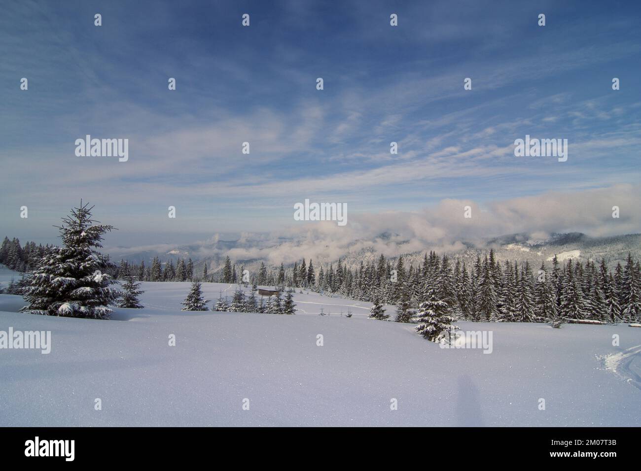 Grey clouds above snowy hi-res stock photography and images - Alamy