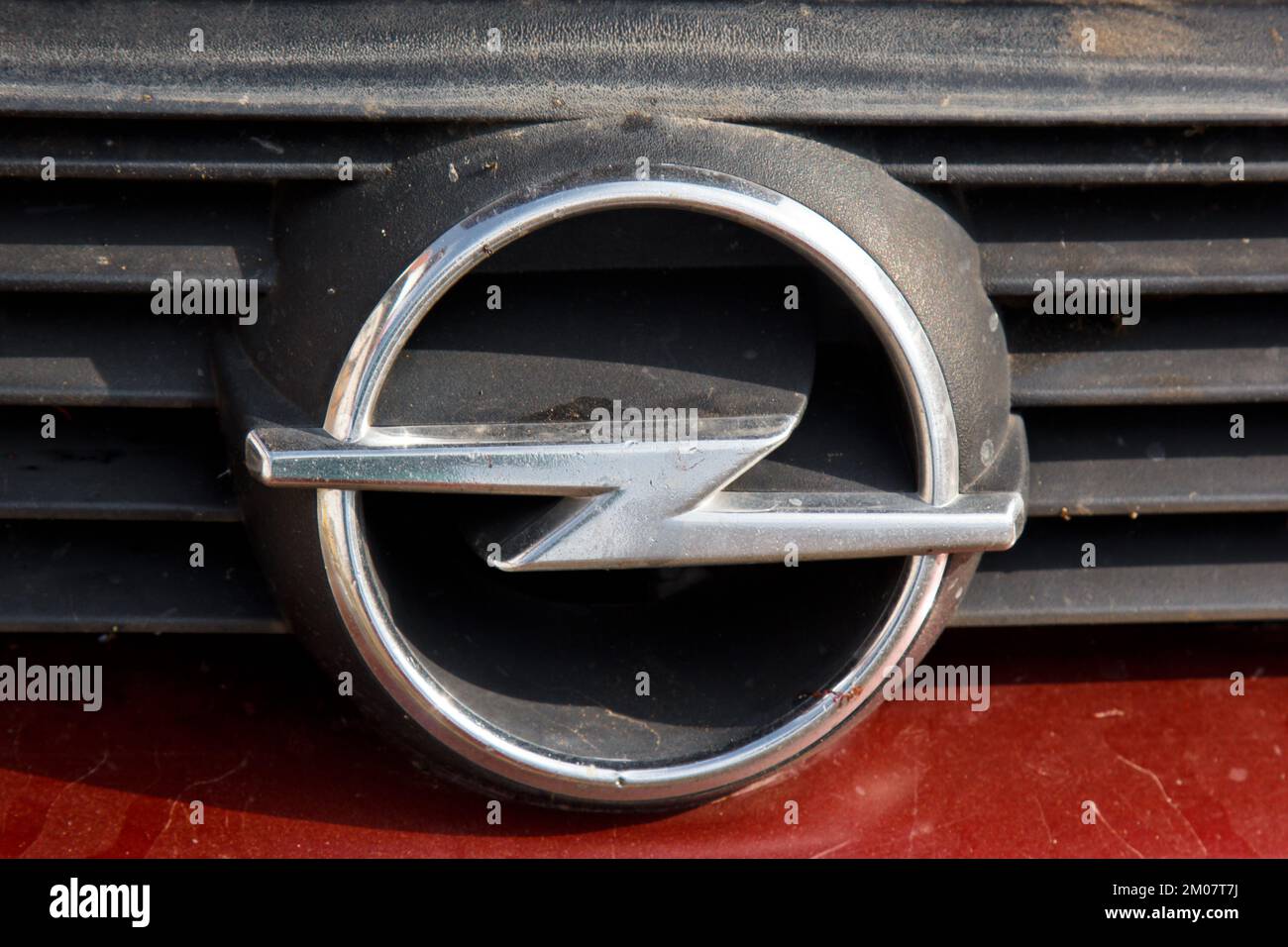 Opel car logo, close-up on a wheel drive. Car company Stock Photo - Alamy