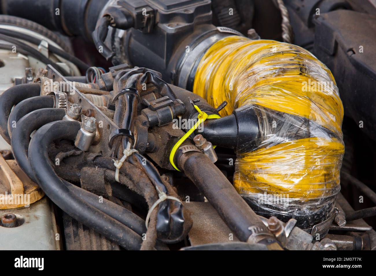 Old used diesel engine with rusty and dirty auto parts, water ...