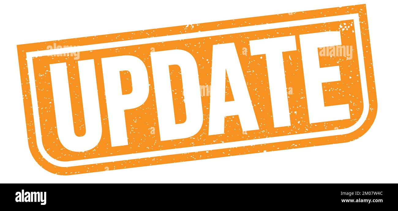 UPDATE text written on orange grungy stamp sign Stock Photo - Alamy