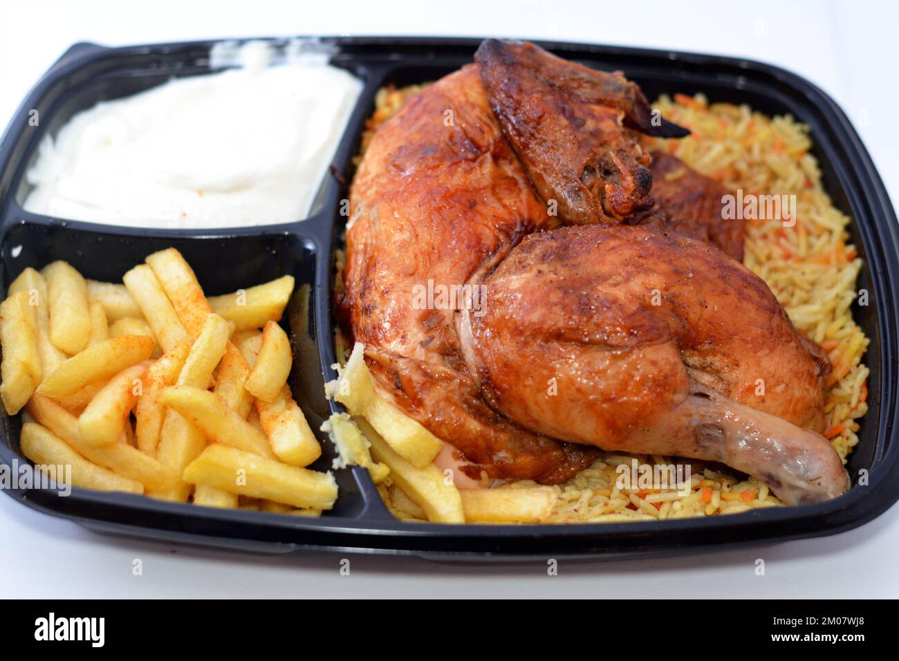 Arabic Syrian cuisine of machine grilled barbecued chicken with ...