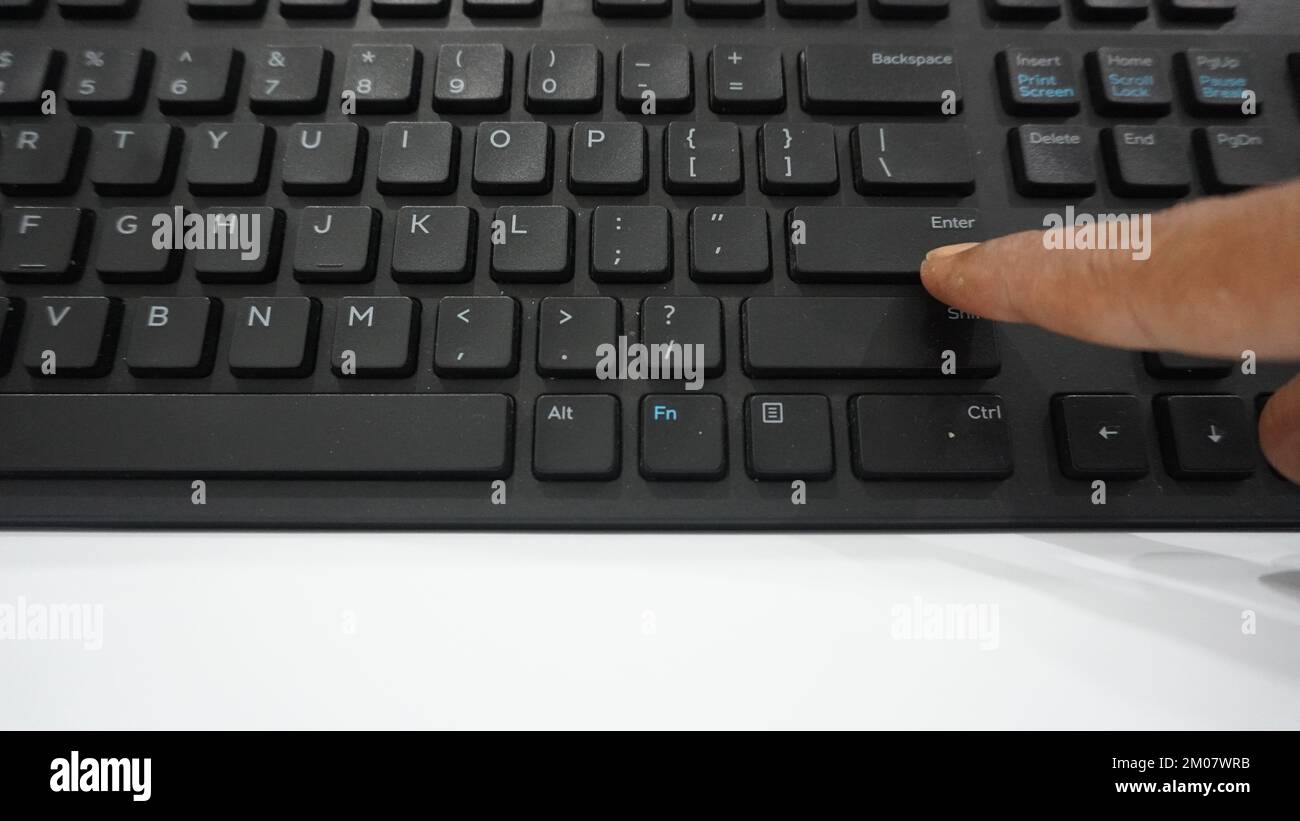 Close up computer keyboard with signature sign marker in office or ...