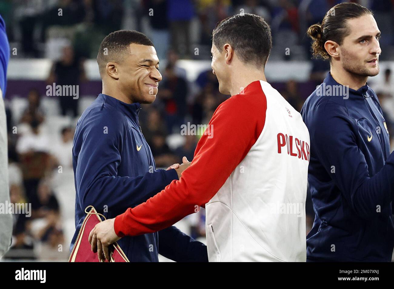 DOHA - (l-r) Kylian Mbappe of France, Robert Lewandowski of Poland ...