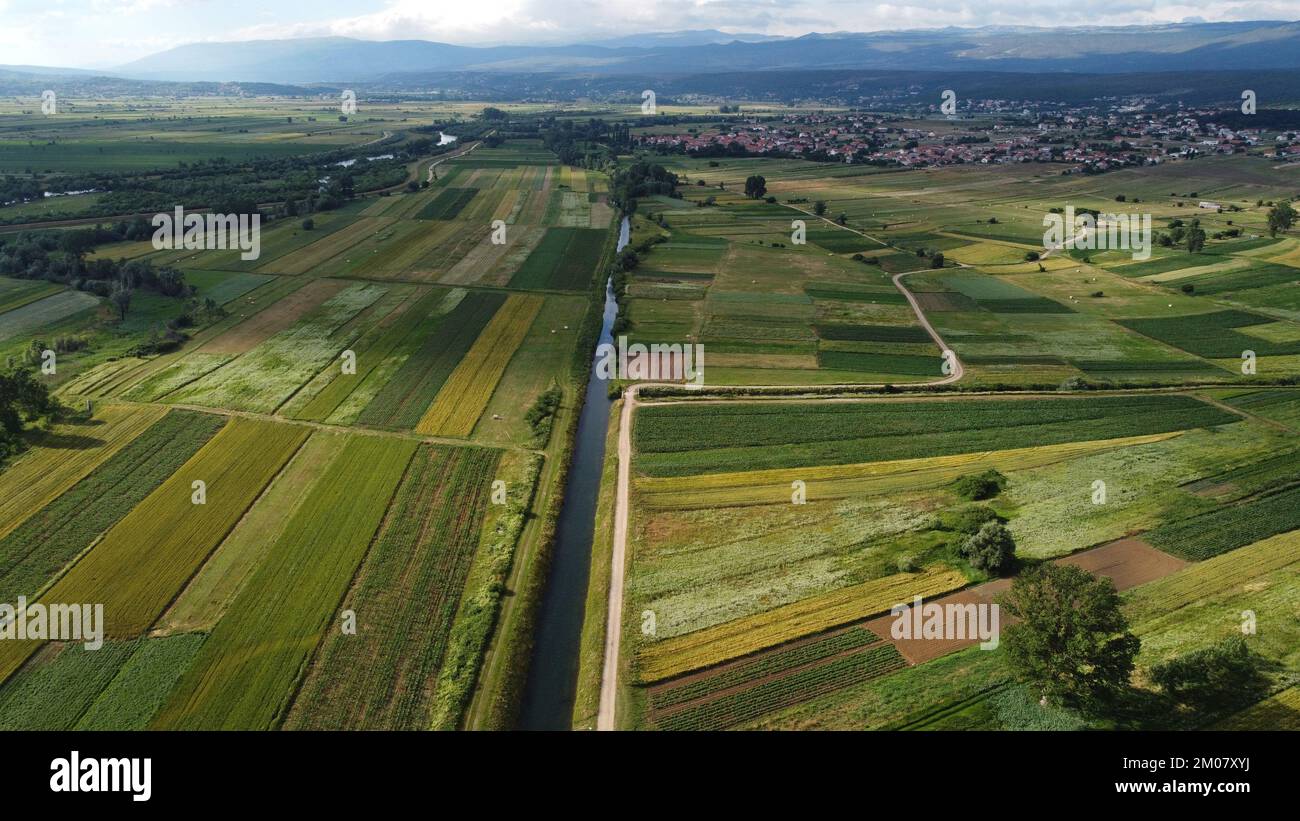 An aerial of colorful arable lands fields townscape background Stock ...