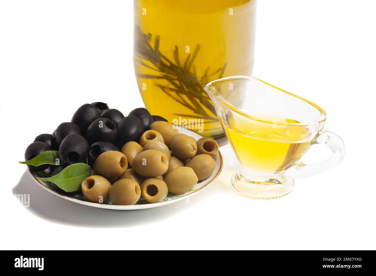 Jug with olive oil, green and black olives isolated on white background ...