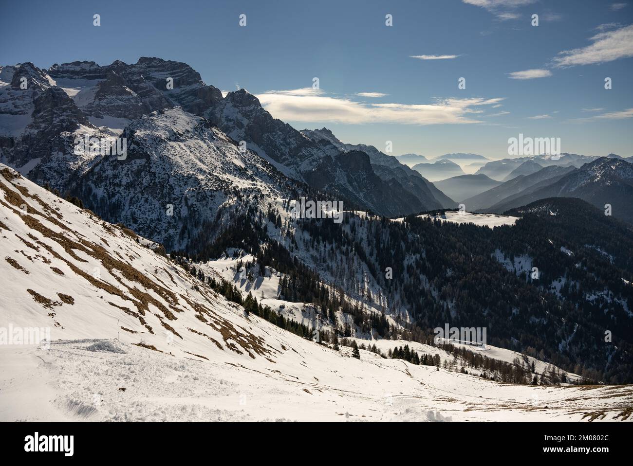 Pinzolo in winter sunny day. Val Rendena dolomites Italian alps ...