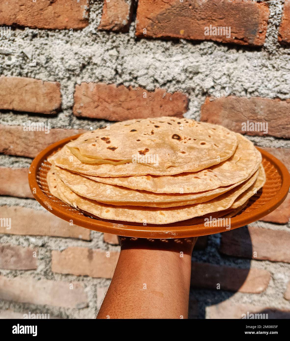 Chapati, also known as roti, rotli, safati, shabaati, phulka, chapo ...